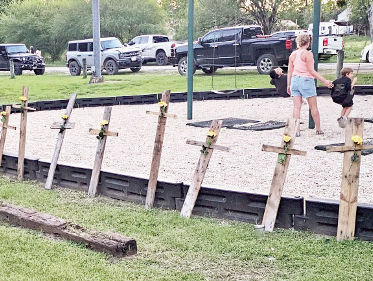 Community honors flood victims in riverside ceremony